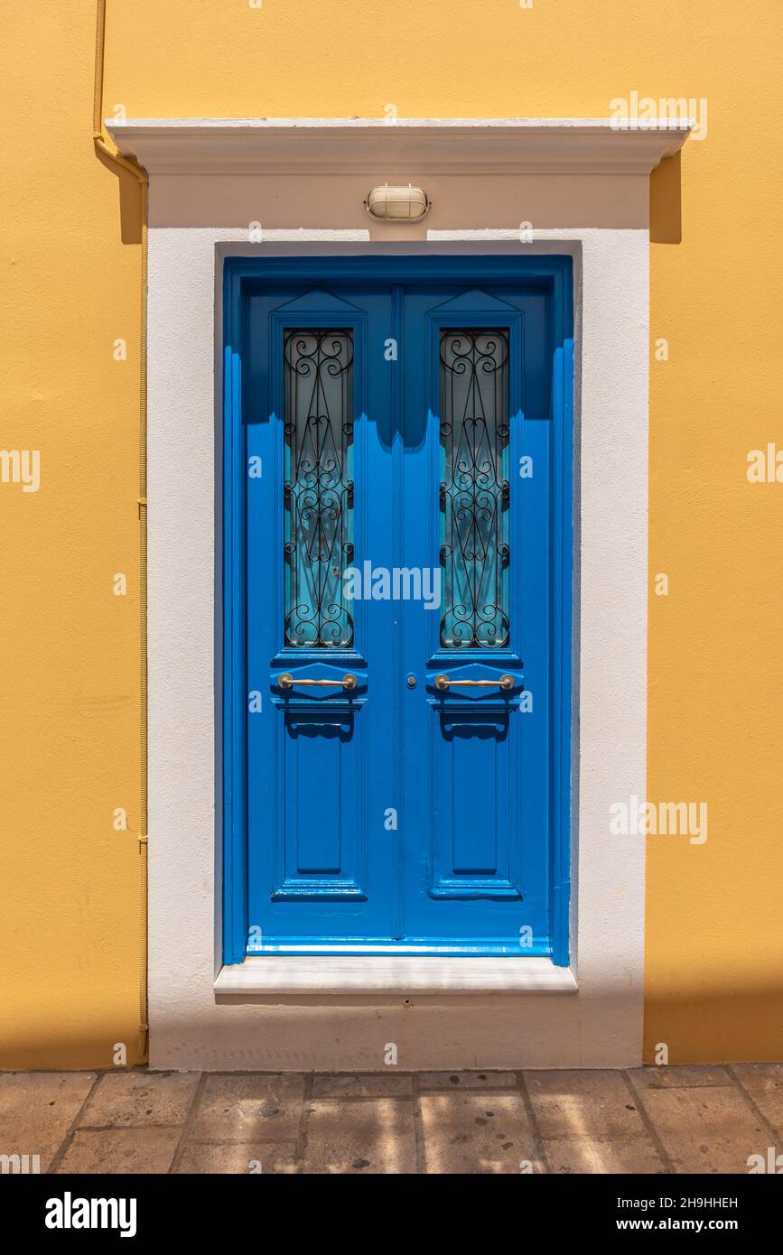 Blue door of a traditional Greek house on Symi island in Greece Stock ...