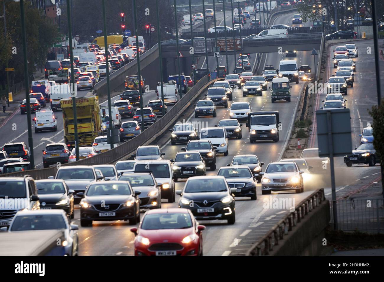Heavy early evening commuter traffic at dusk on the A3 Trunk Road ...