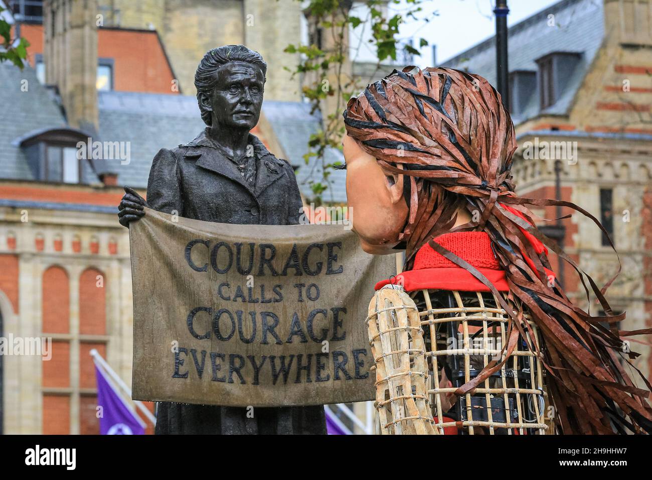 Westminster, London, UK. 7th Dec, 2021. Little Amal with the statue of ...