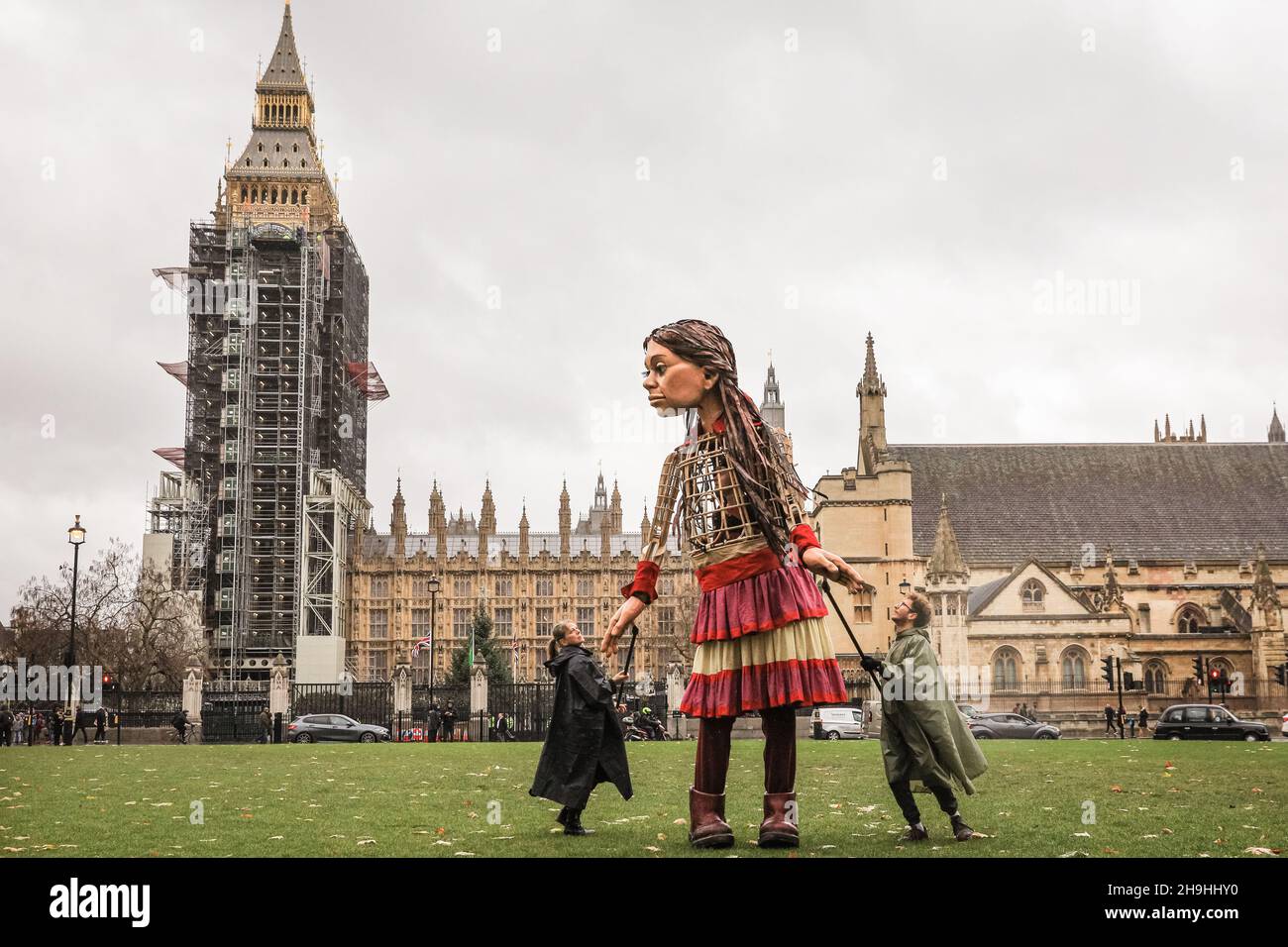 Westminster, London, UK. 7th Dec, 2021. Little Amal, the giant puppet ...