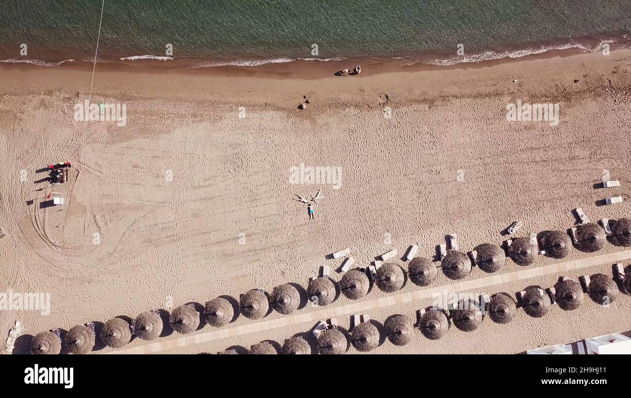Group of friends lying down on the beach. Video. Tropical holidays on ...