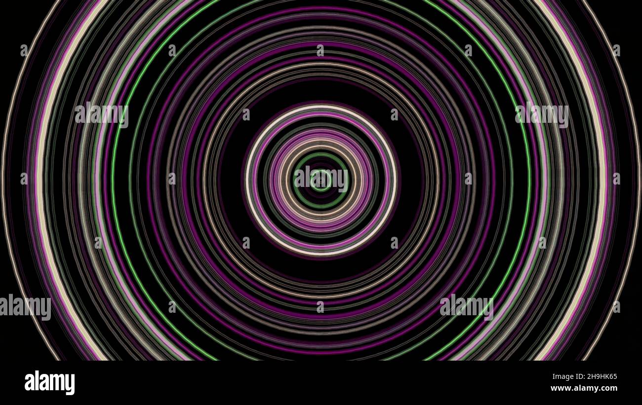 Abstract hypnotic circles moving on the black background. Abstract ...