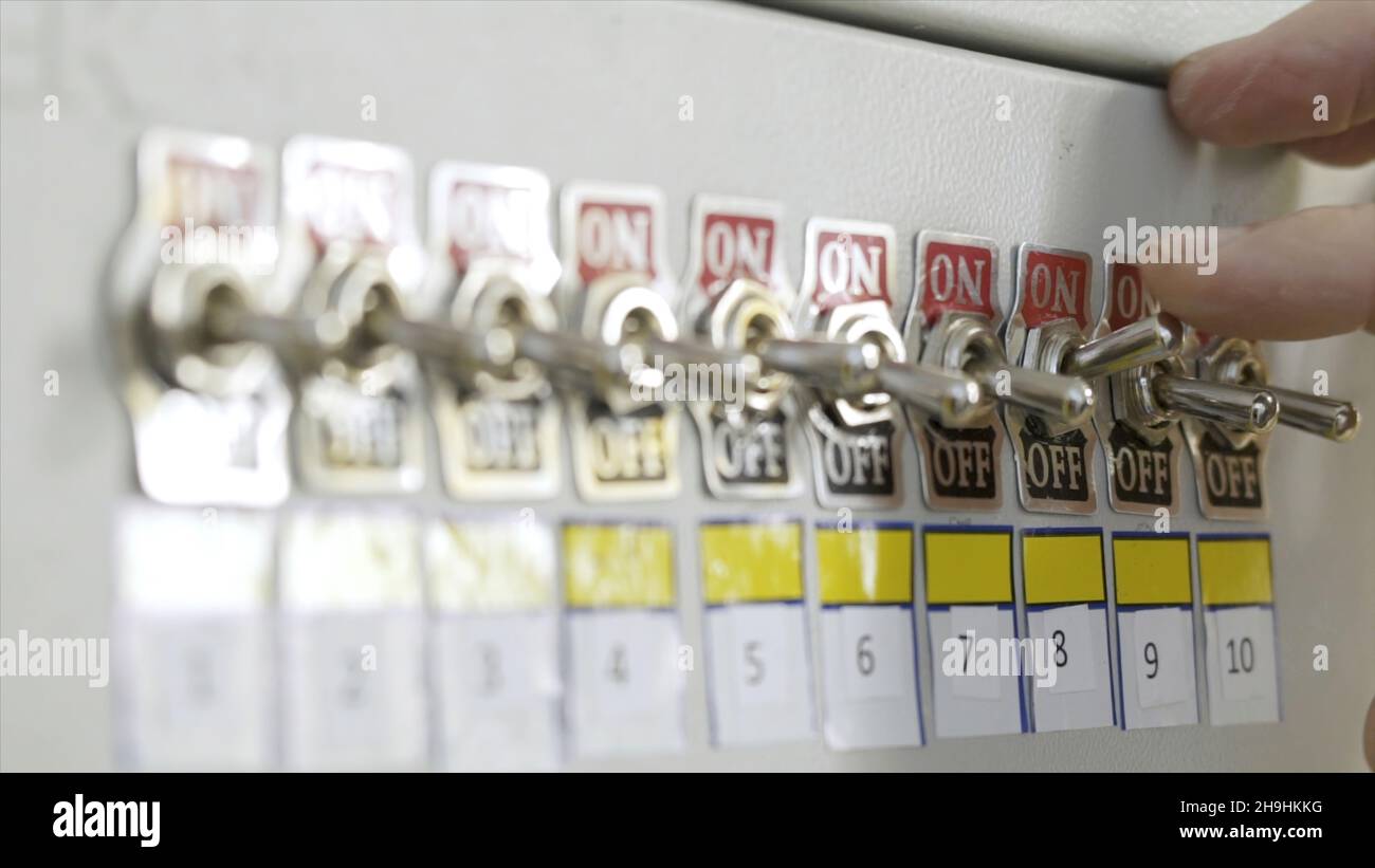 Close-up of fuse switch panel. Action. Manual panel with toggle ...