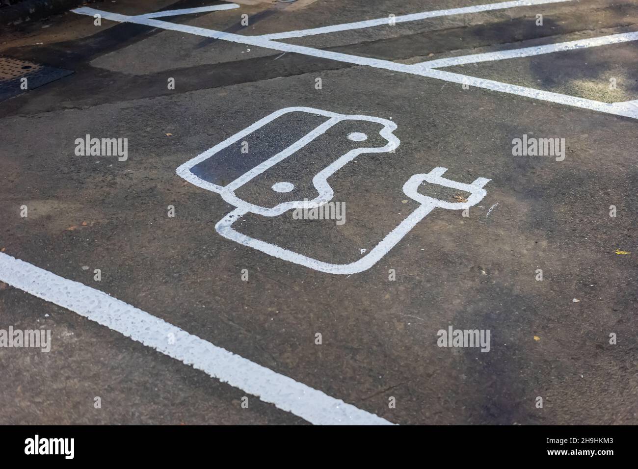 Electric vehicle recharging point road marking sign in England UK Stock ...