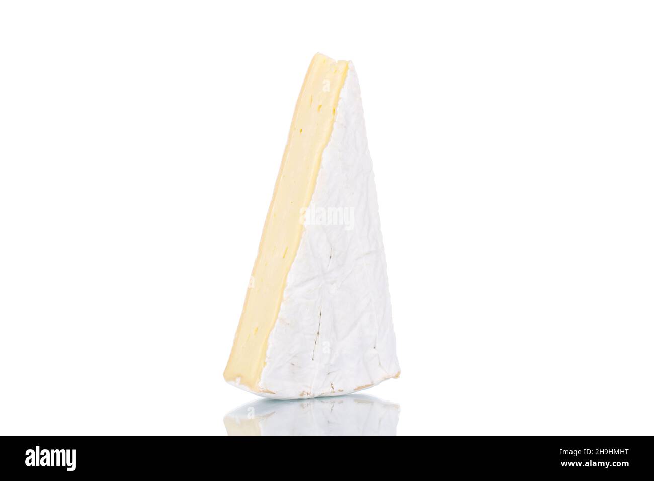 One fresh slice of brie cheese, close up, isolated on white Stock Photo ...