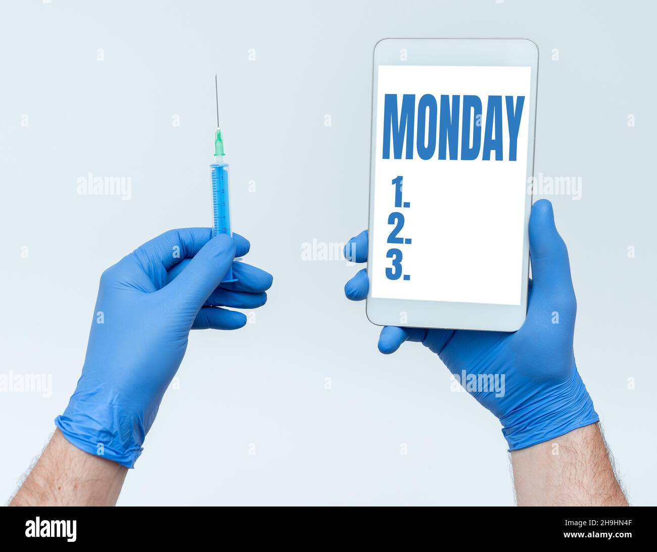 Hand writing sign Monday. Business overview the day of the week after ...