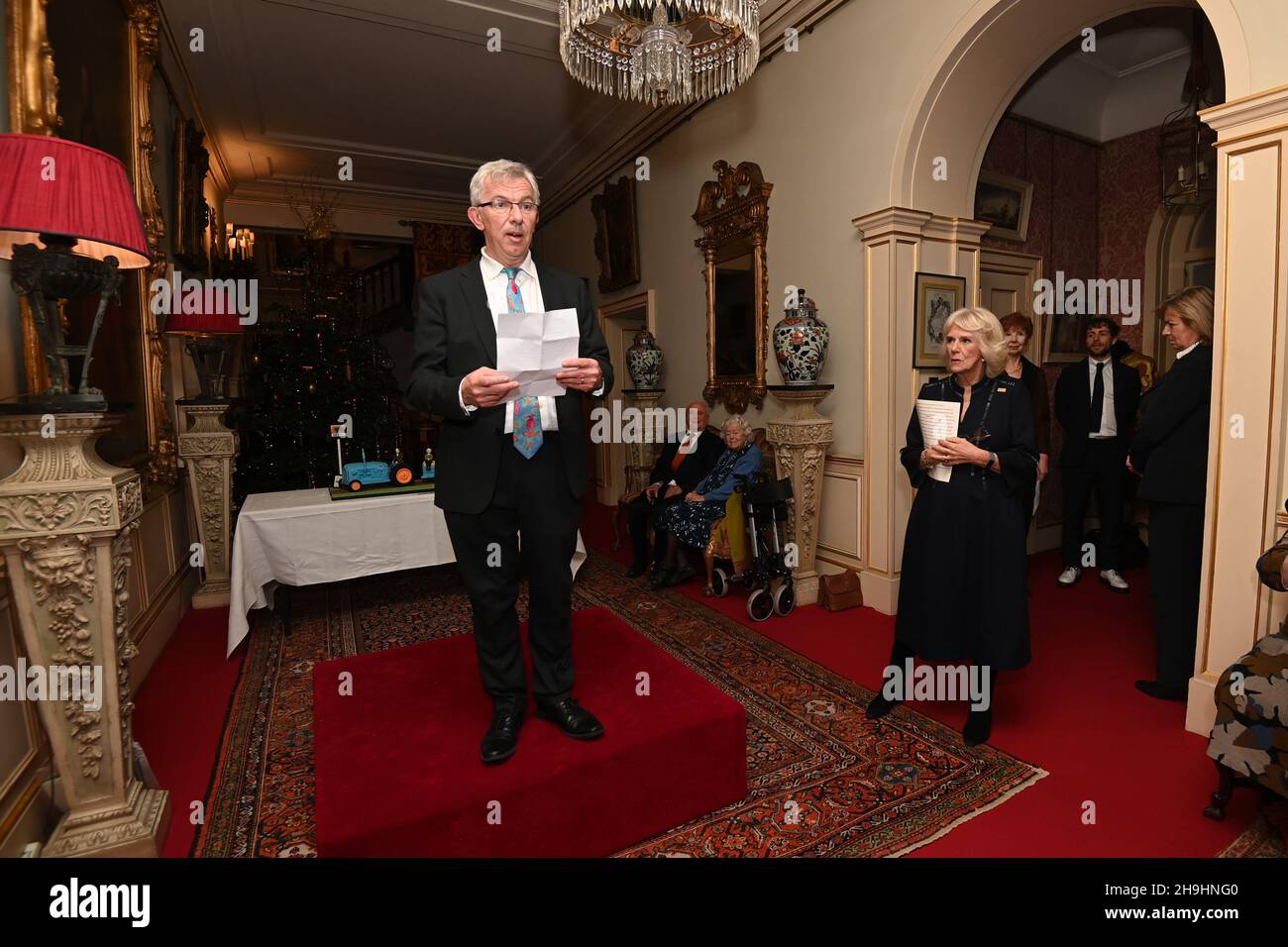 The Duchess of Cornwall listens as Jeremy Howe makes a speech during a ...