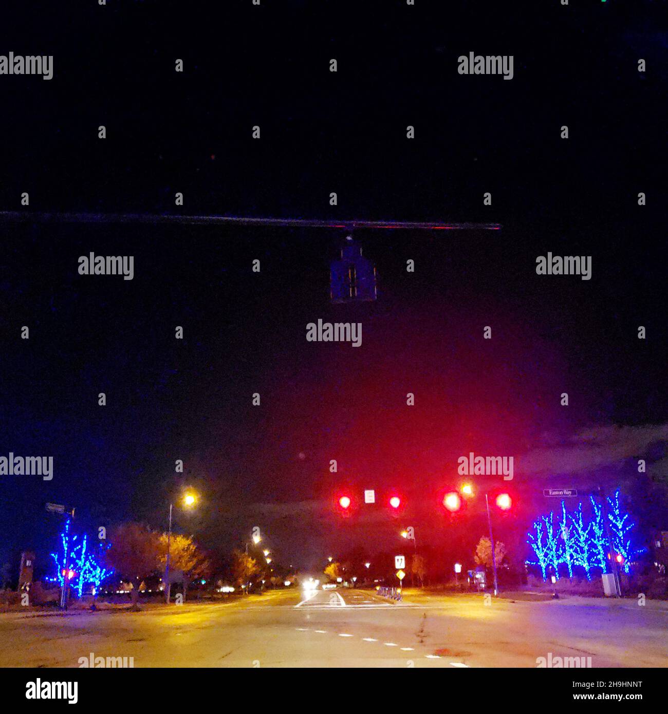 Christmas lights next to a road at night Stock Photo - Alamy