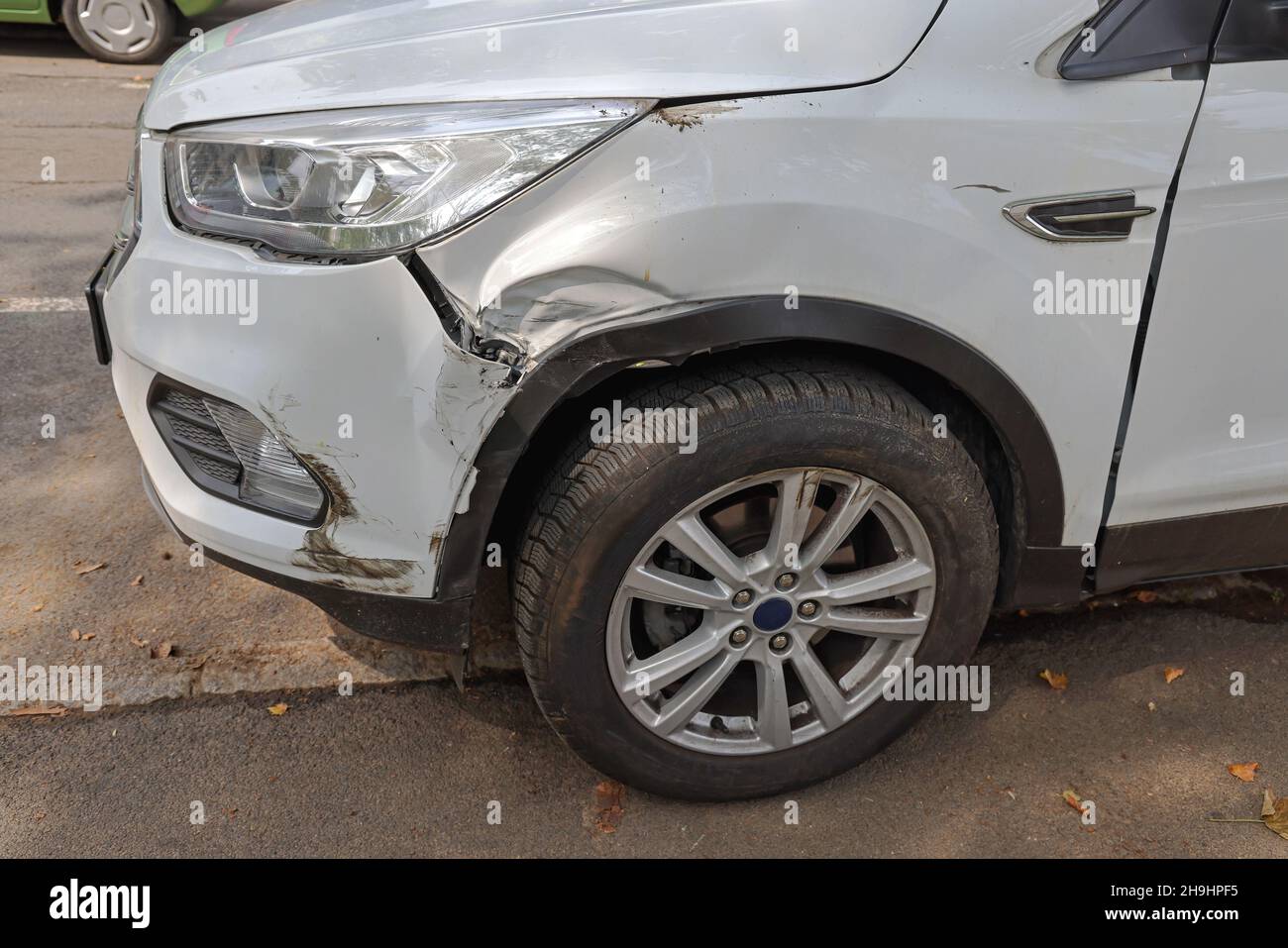 Small Accident Damage at Front and Side at New White Suv Stock Photo ...