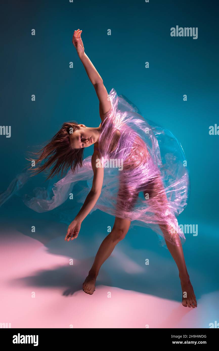 Solo performance. Beautiful flexible contemp dancer dancing with fabric ...