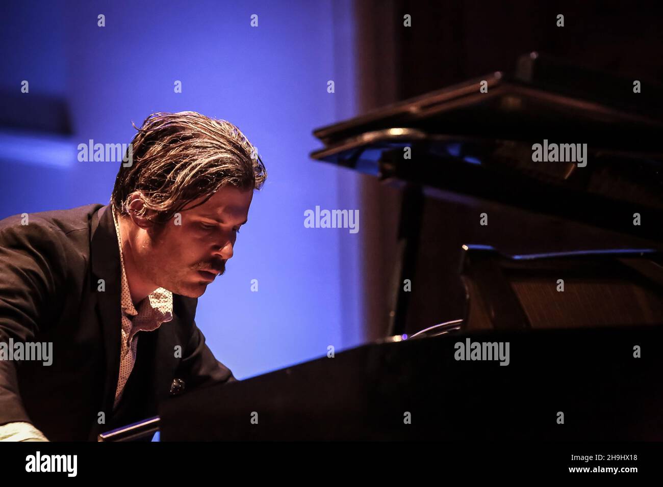 Ed Harcourt performing live on stage at Cadogan Hall in London Stock ...