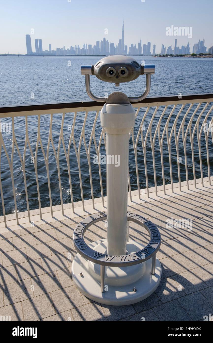 A viewing machine at Dubai Creek looking towards Downtown and the Burj ...