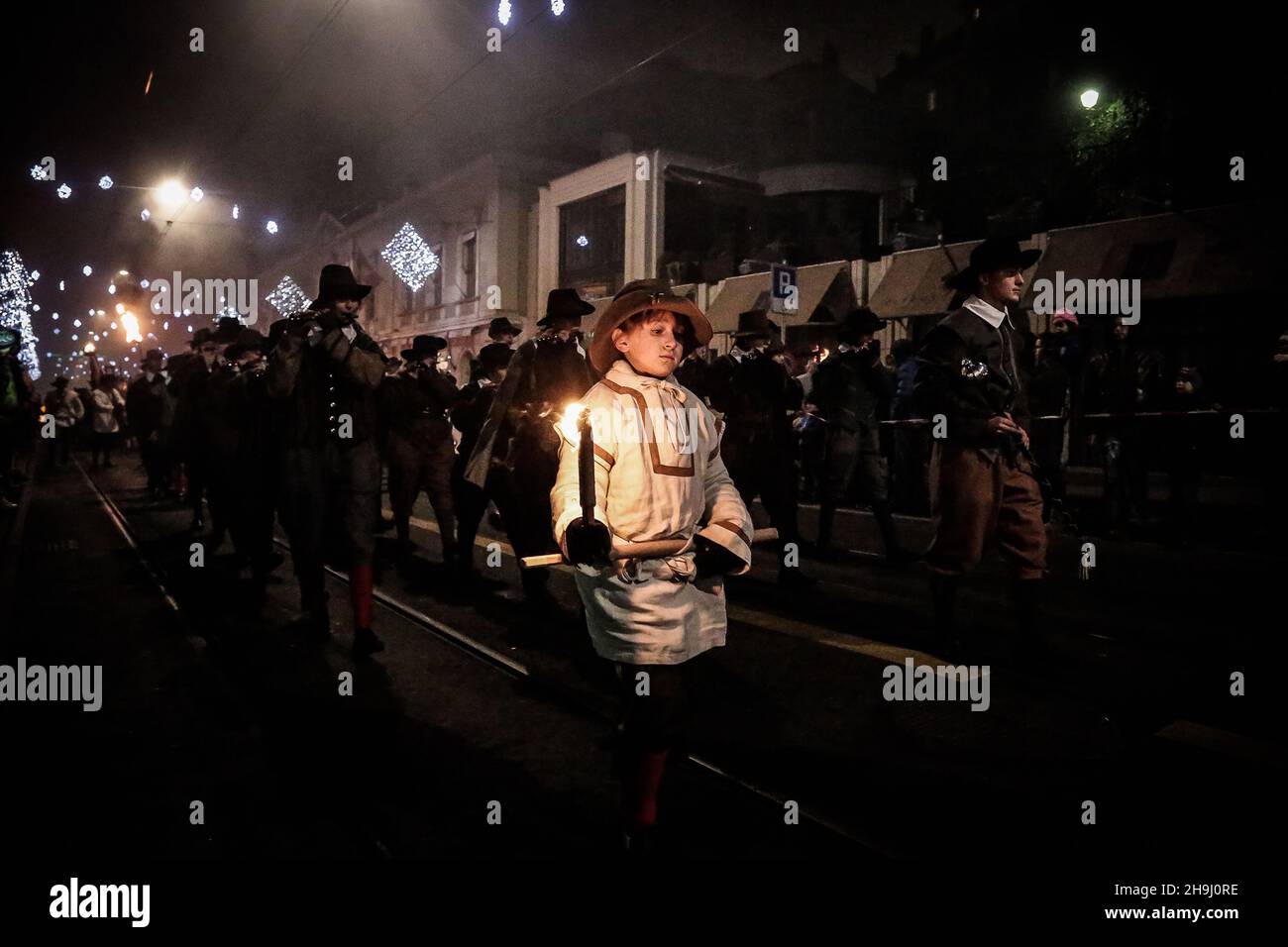Scenes from the 2013 Escalade procession in Geneva, Switzerland. The ...