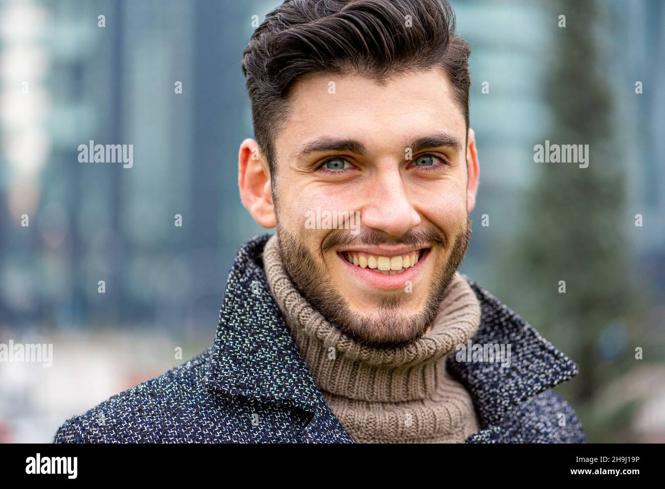 portrait of an handsome man smiling Stock Photo - Alamy