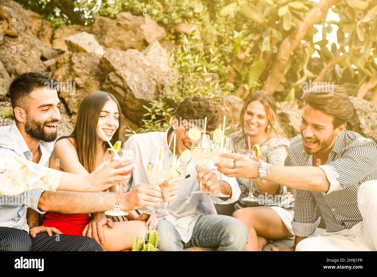 Friends having fun and drinking mocktails, group of friends hanging out ...