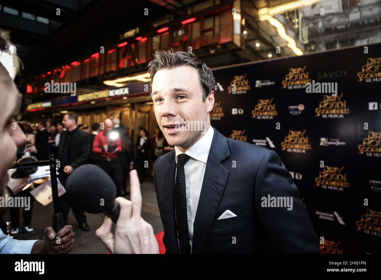 Greg Burns on the red carpet at the opening night of Dirty Rotten ...