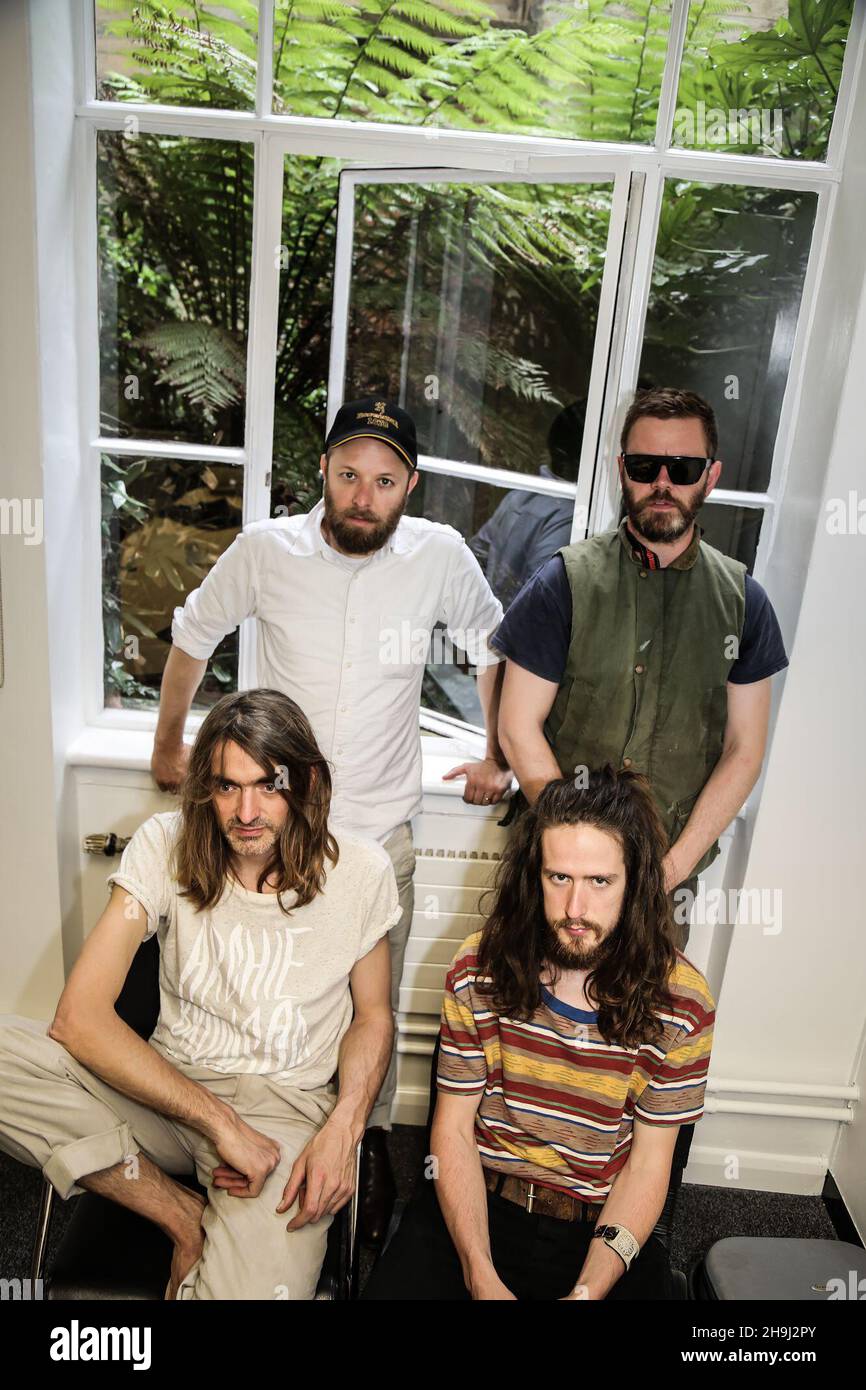 EXCLUSIVE: Archie Bronson Outfit pose for photos before going on stage ...