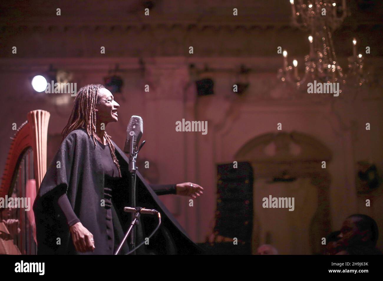 ALA.NI performing with her band on stage at Bush Hall supporting Ibeyi ...