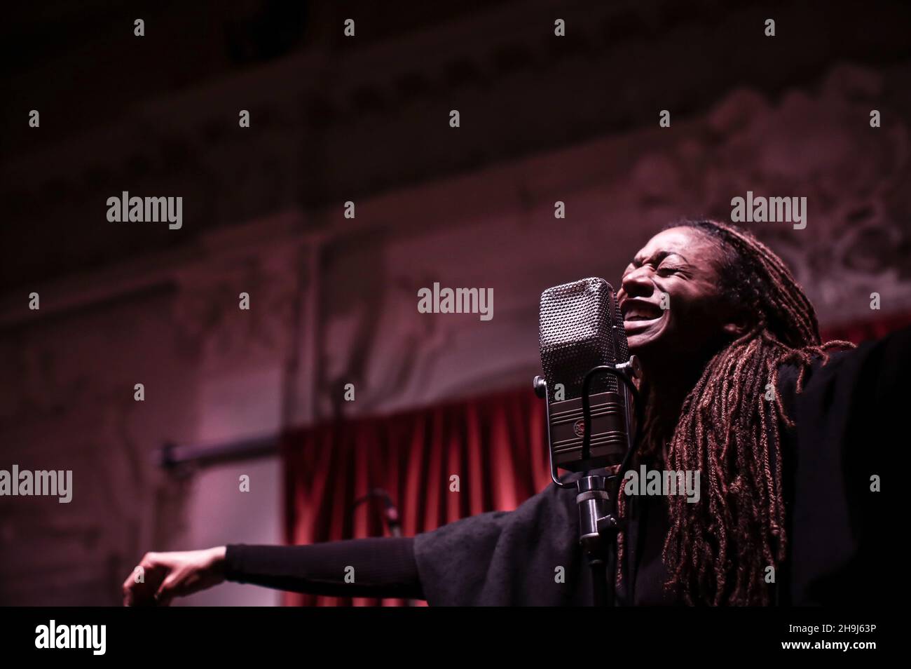 ALA.NI performing with her band on stage at Bush Hall supporting Ibeyi ...