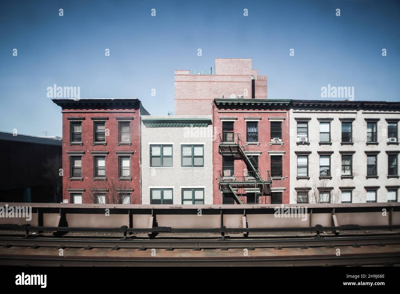 Buildings in the Bronx in New York City as seen from a train going ...