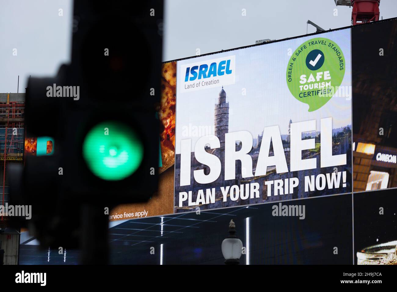 An advertisement for Israeli tourism is displayed on a large electric ...