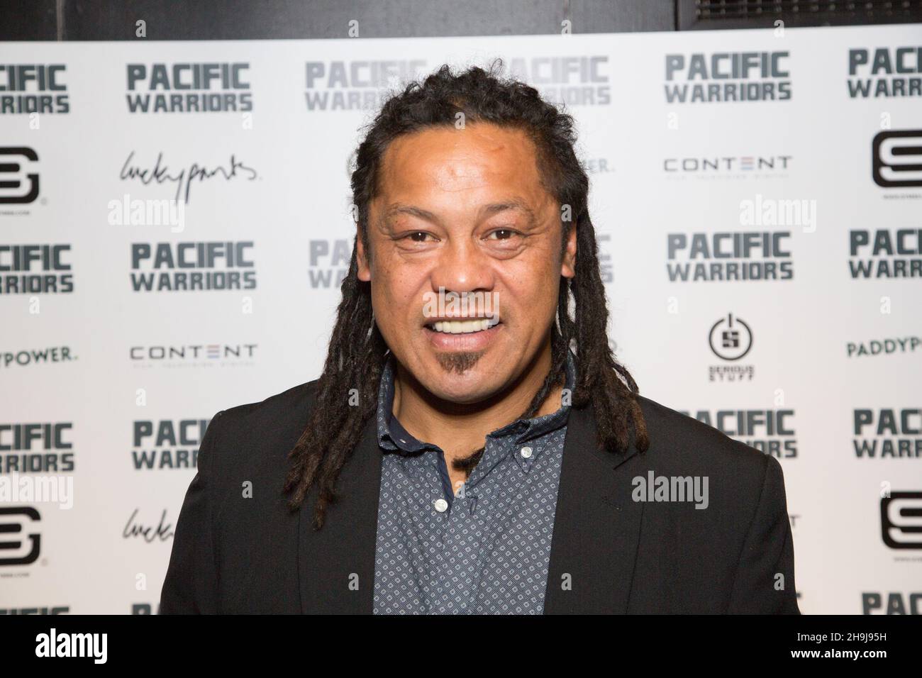 Mike Umaga poses for photos as former and current players from the ...