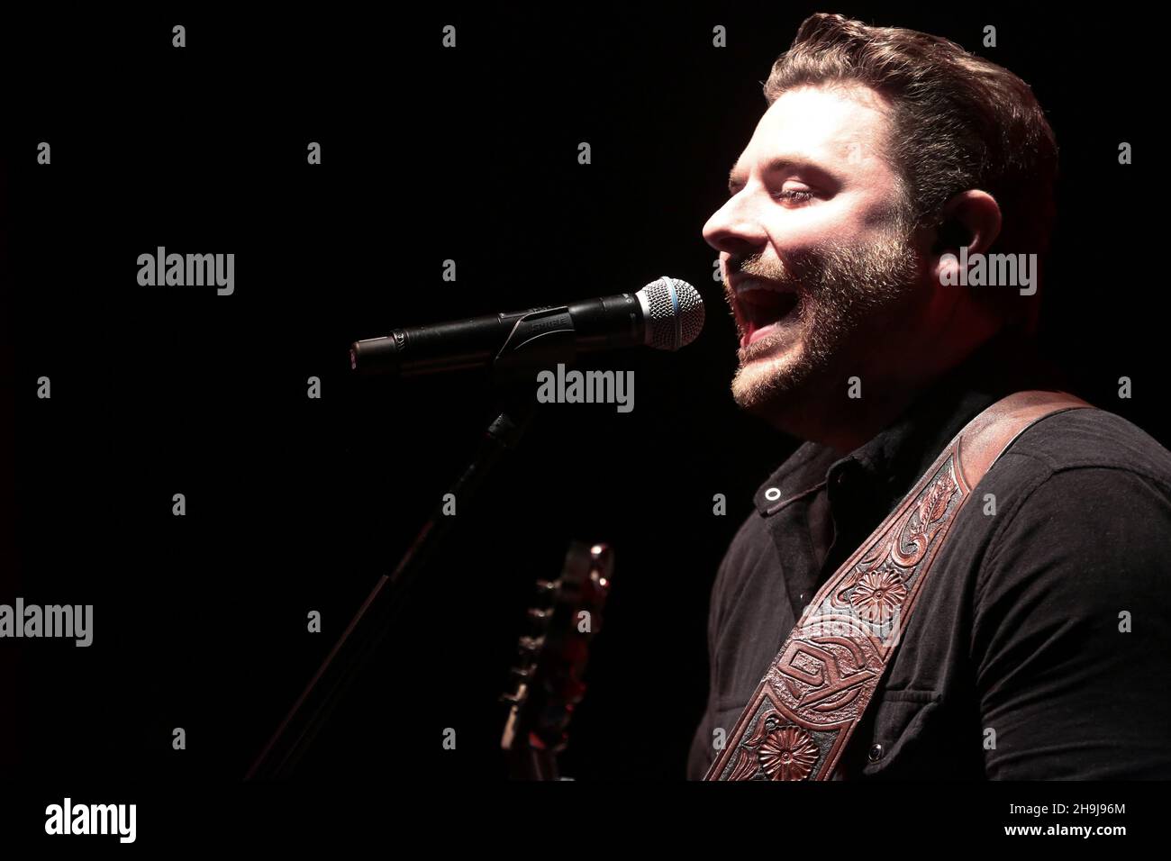 Country singer Chris Young performing live on stage at the Shepherds ...