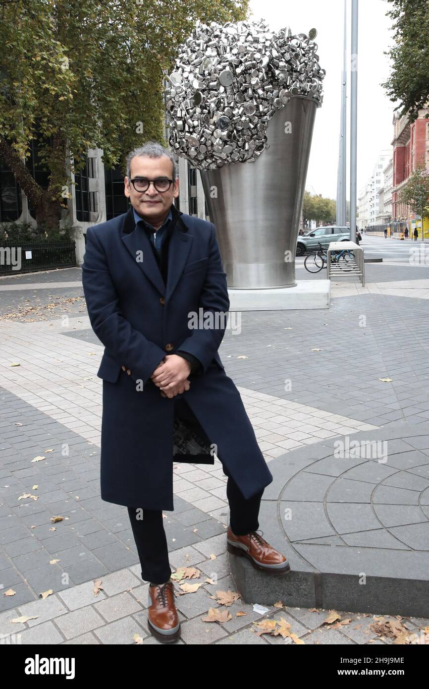 The artist Subodh Gupta poses for photos in front of his new ...