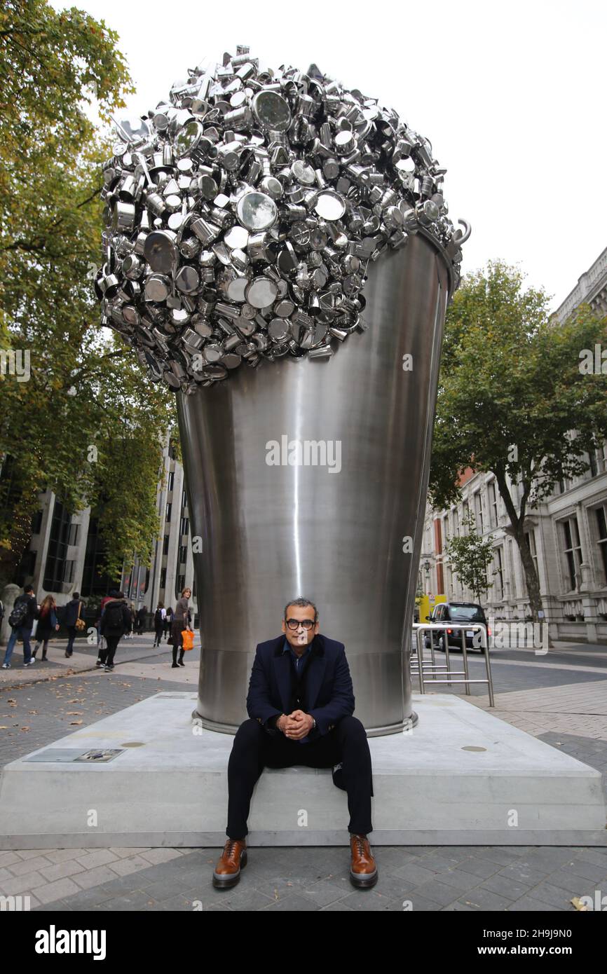 The artist Subodh Gupta poses for photos in front of his new ...
