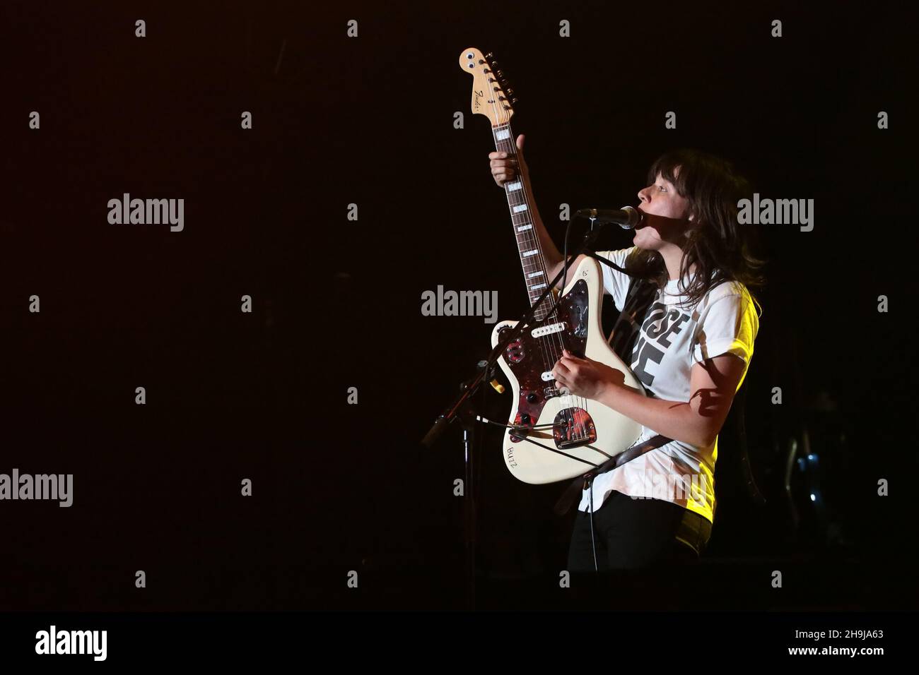 Courtney Barnett and her band performing live on stage at The O2 Forum ...