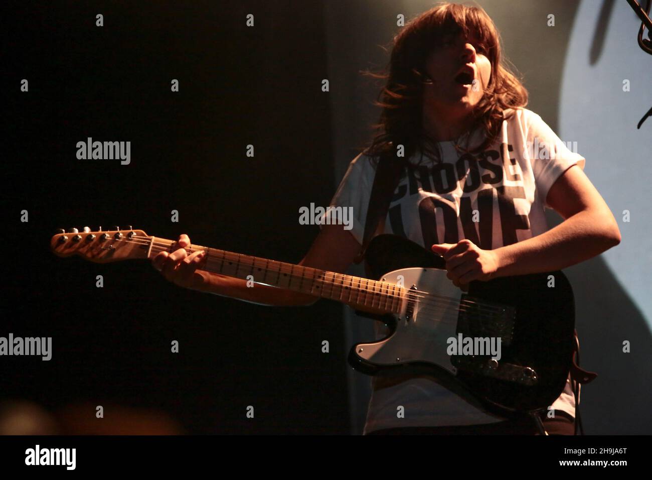Courtney Barnett and her band performing live on stage at The O2 Forum ...