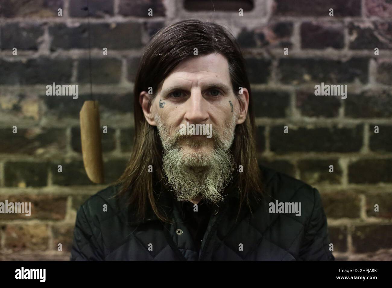 Dylan Carson poses for photos before going on stage at Bush Hall in ...
