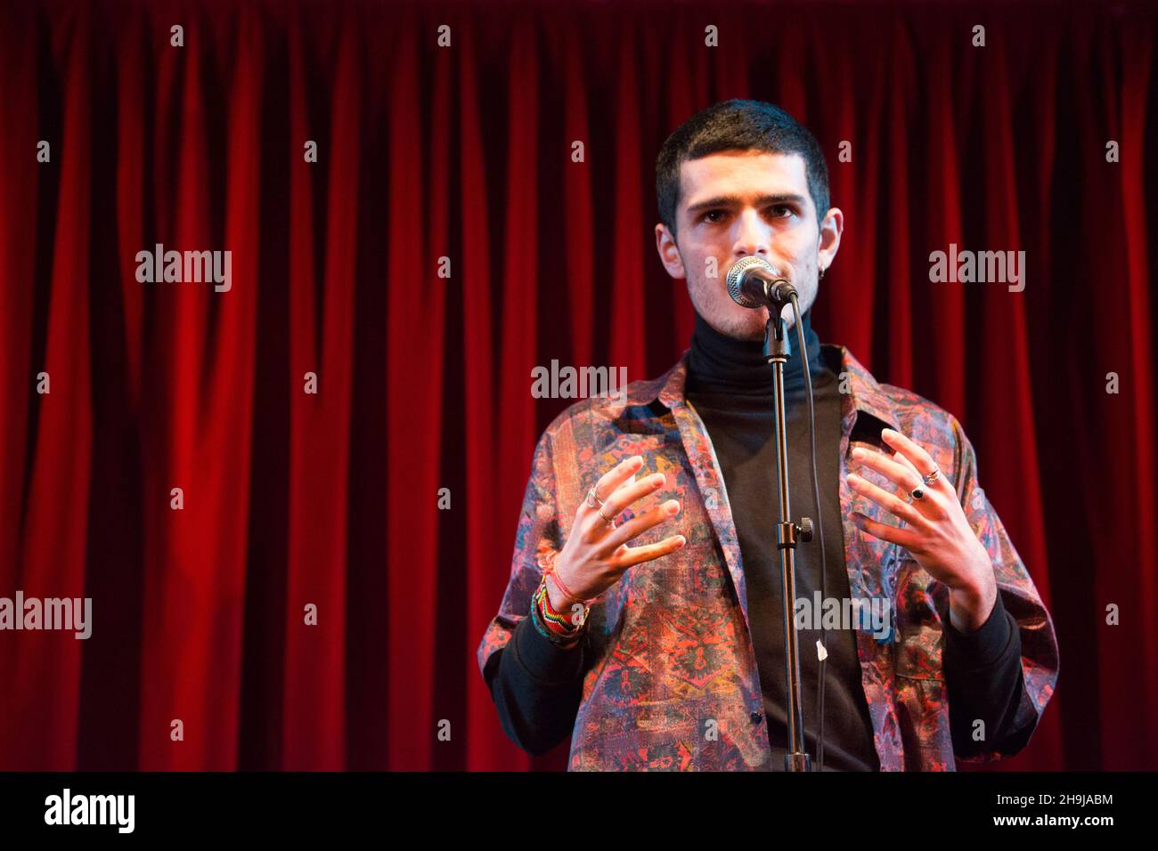 Shivum Sharma poses for photos before going on stage in support of Flo ...