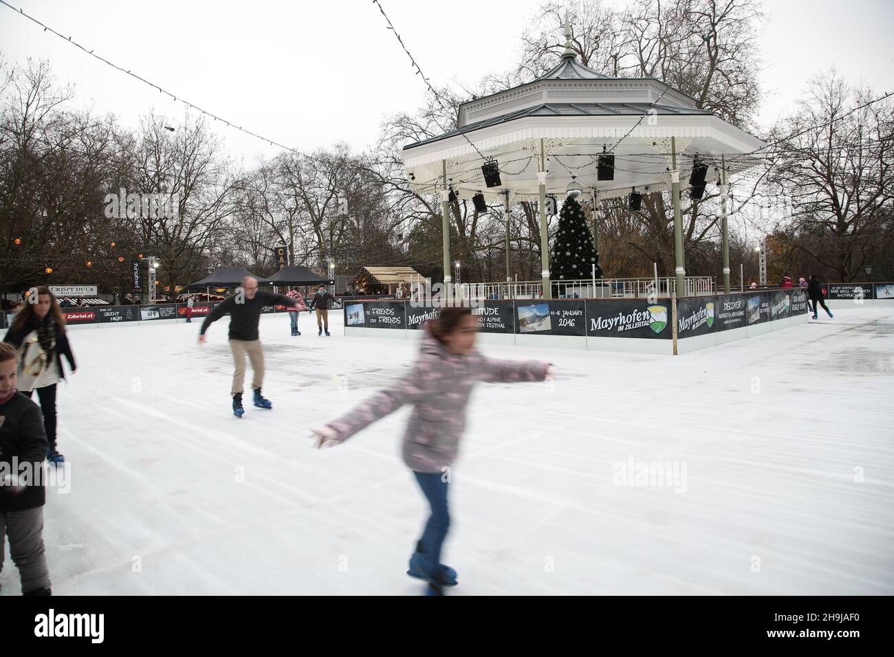 Ice skaters on the ice rink in Hyde Park as part of the Winter ...
