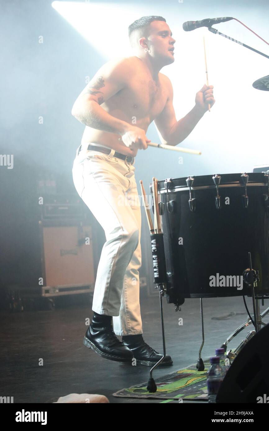Isaac Holman of Slaves performing live on stage to a sold-out Forum in ...