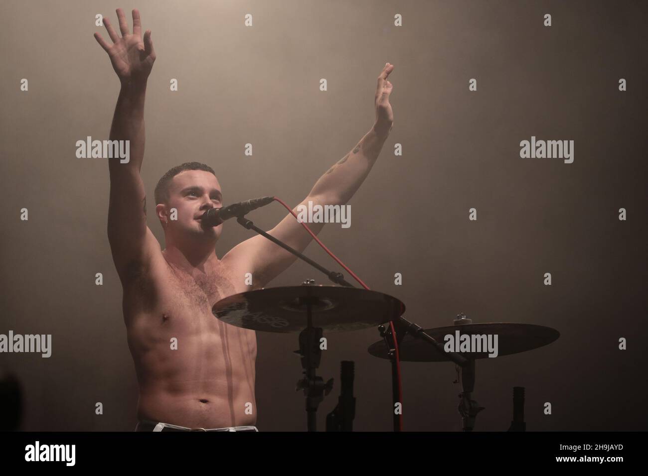 Isaac Holman of Slaves performing live on stage to a sold-out Forum in ...