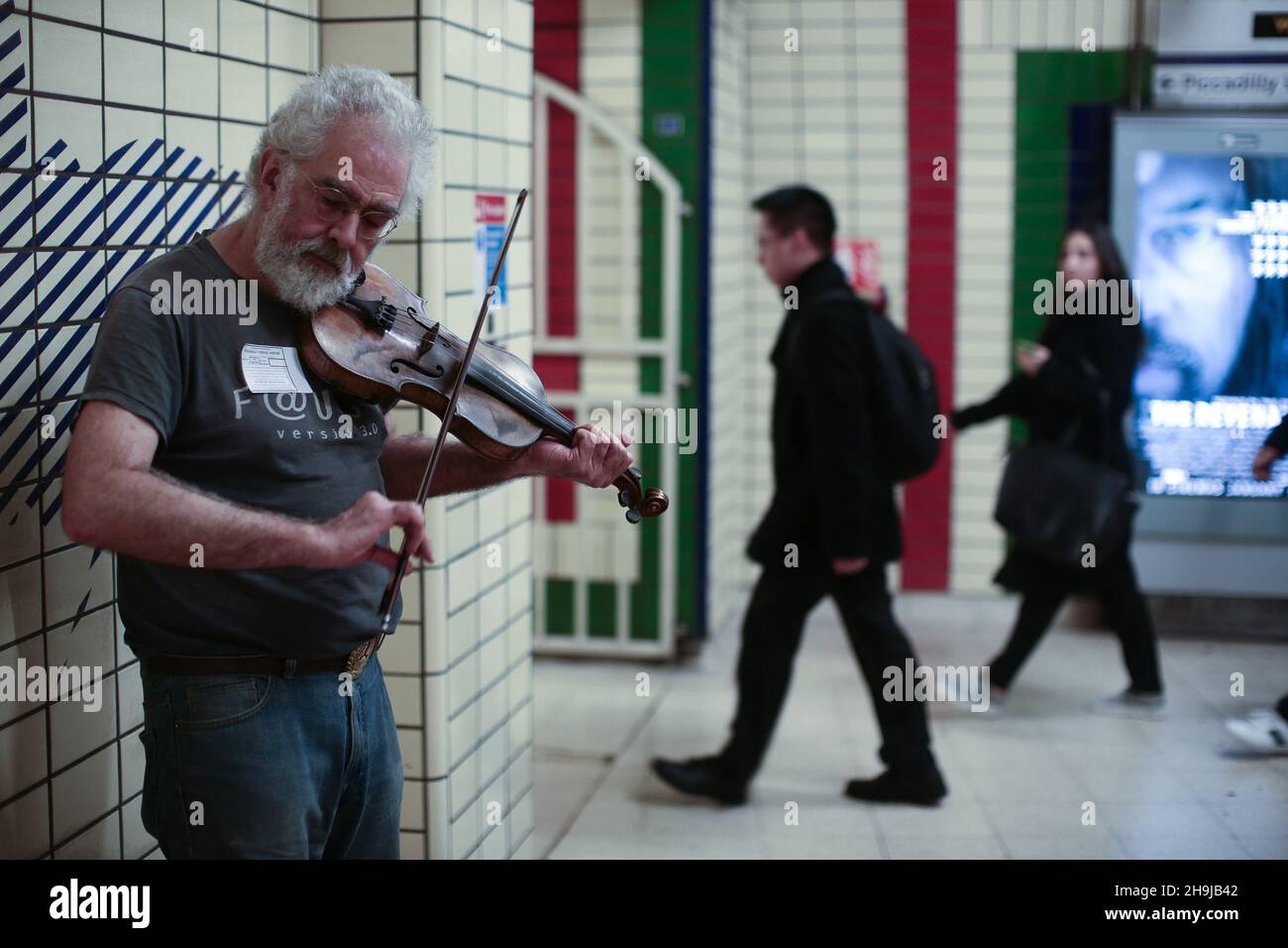Paul Stevens, also known as Paul Fiddle, pictured busking in Leicester ...