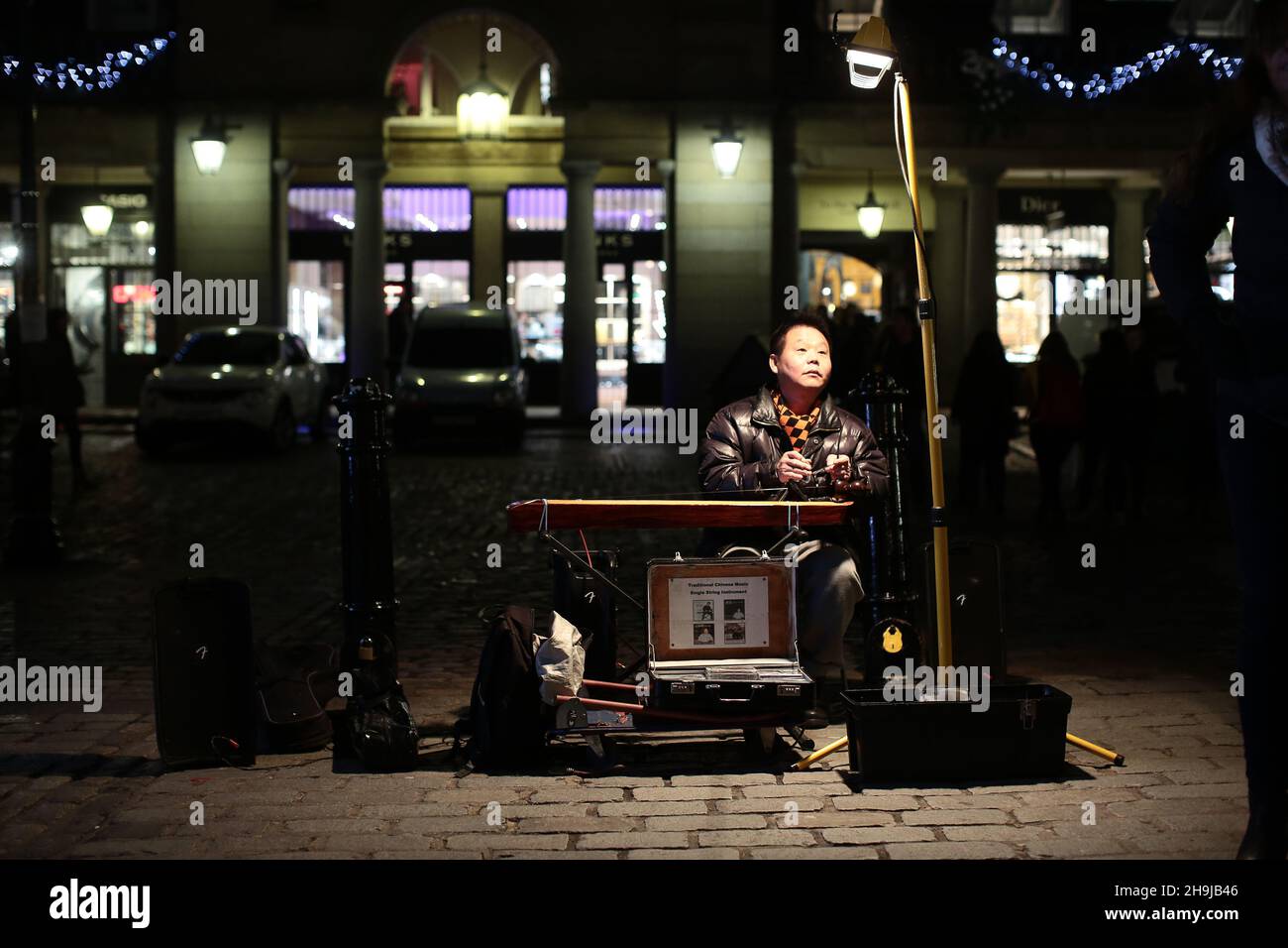 Chang Gui Duo, a Chinese Single String player busking in Covent Garden ...