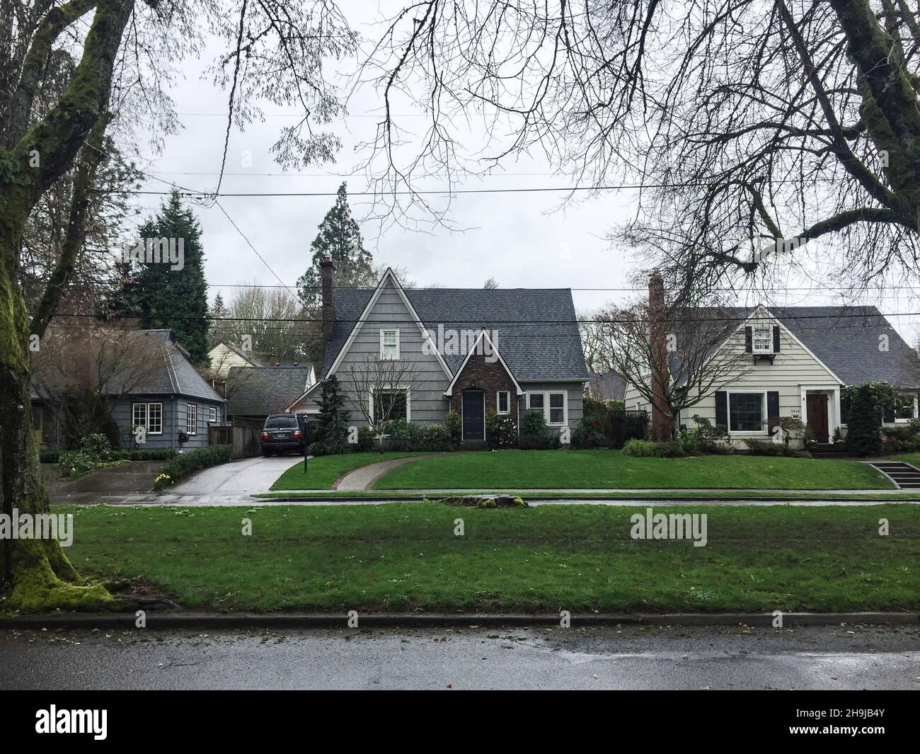 Traditional wooden houses on a surburban street in Portland, Oregon, US ...
