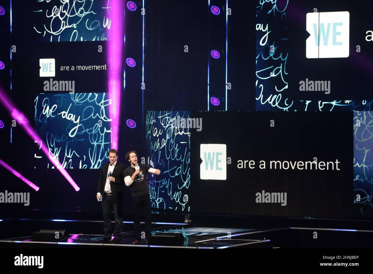 Craig and Marc Kielburger, the founders of the We Movement, on stage at ...