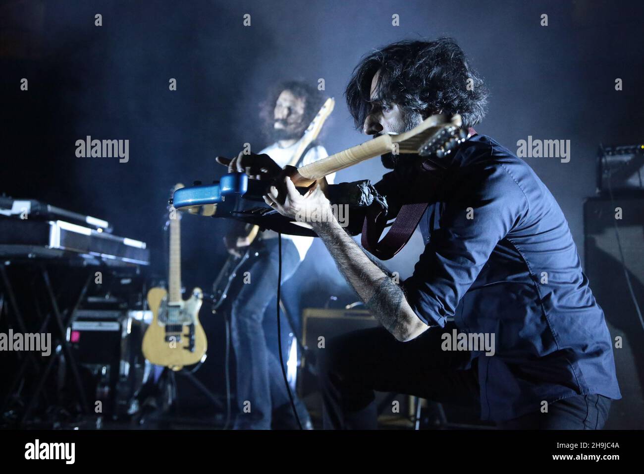 Munaf Rayani of Texan post-rock band Explosions in the Sky performing ...