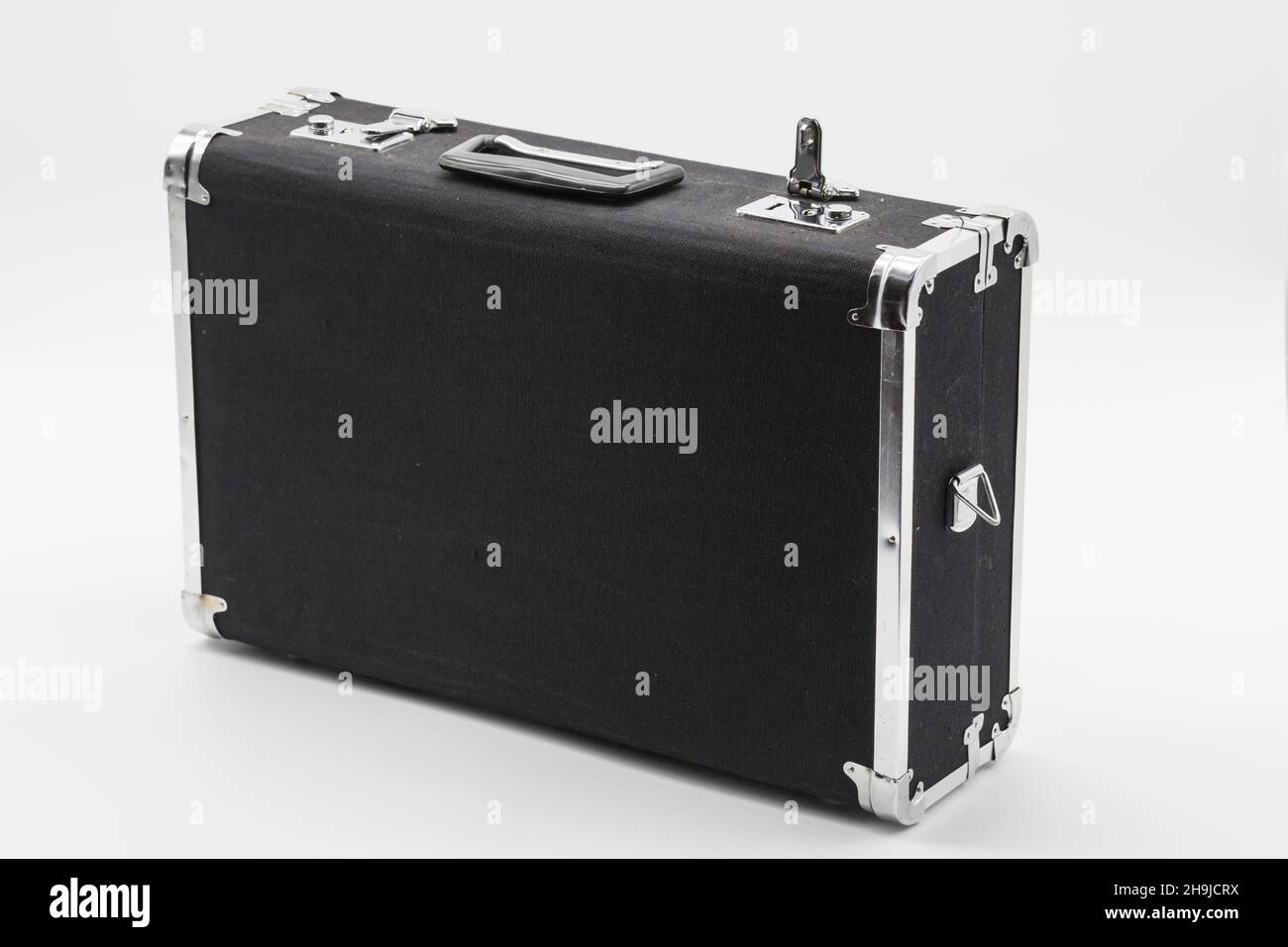Retro, open black briefcase, open on a white background Stock Photo - Alamy