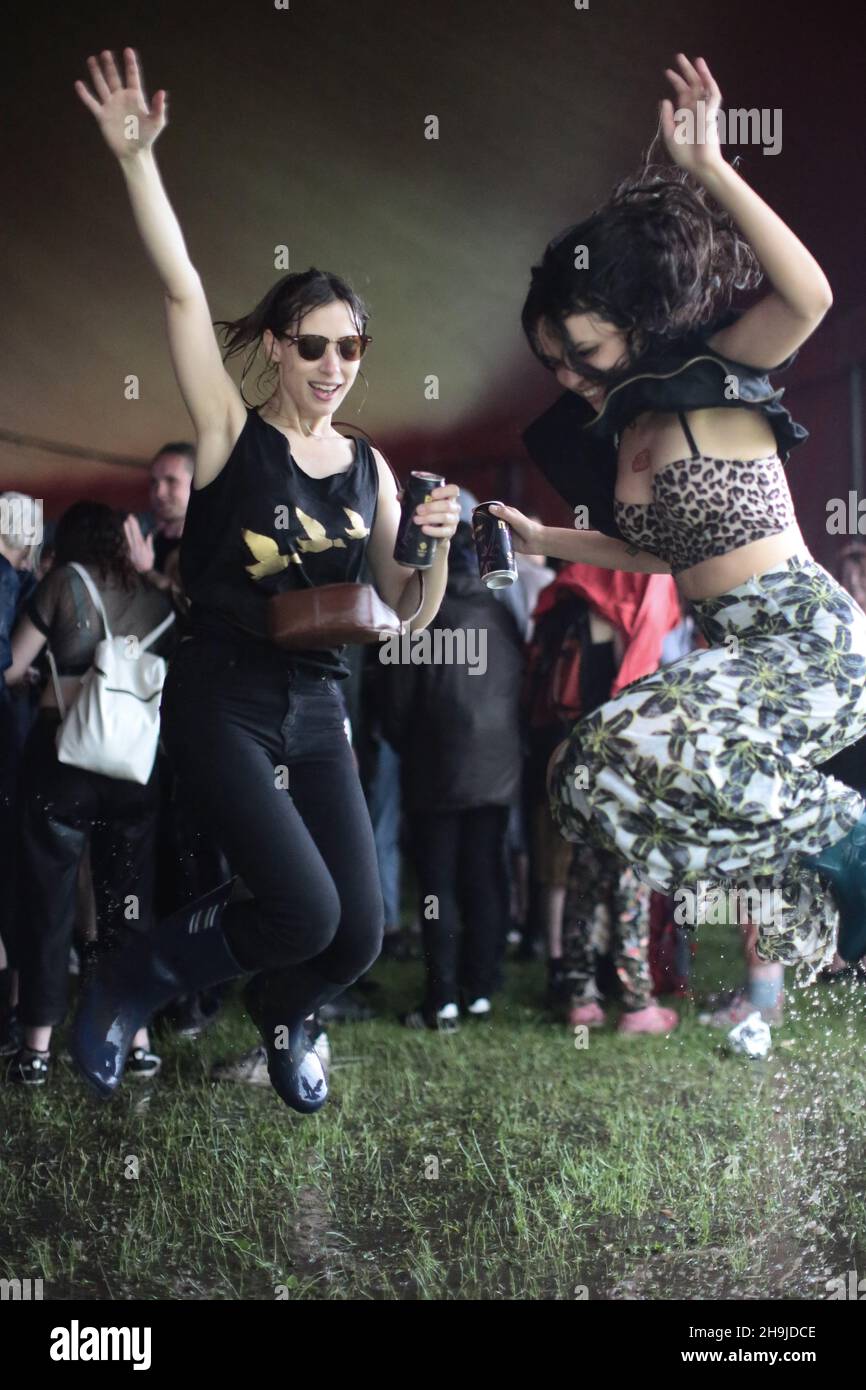 Festival goers in the rain on the first day of the Field Day Festival ...