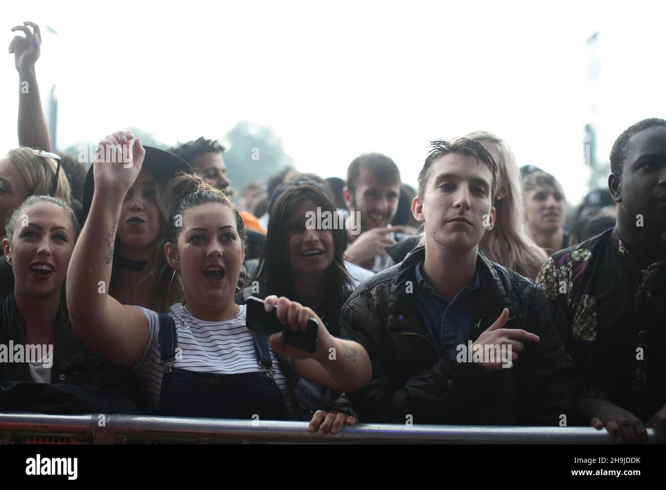 Festival goers enduring heavy rain on the first day of Field Day ...