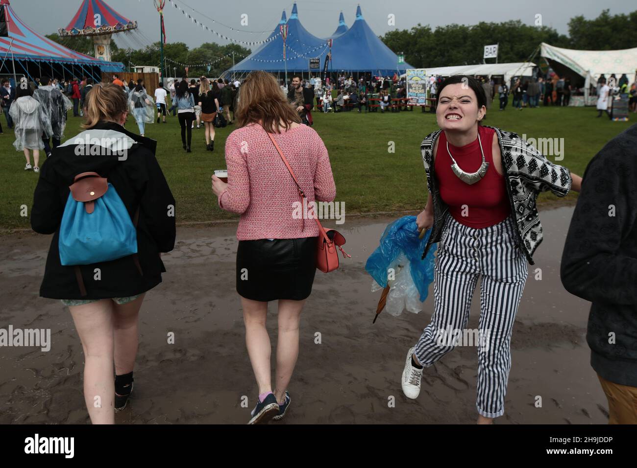 Festival goers enduring heavy rain on the first day of Field Day ...