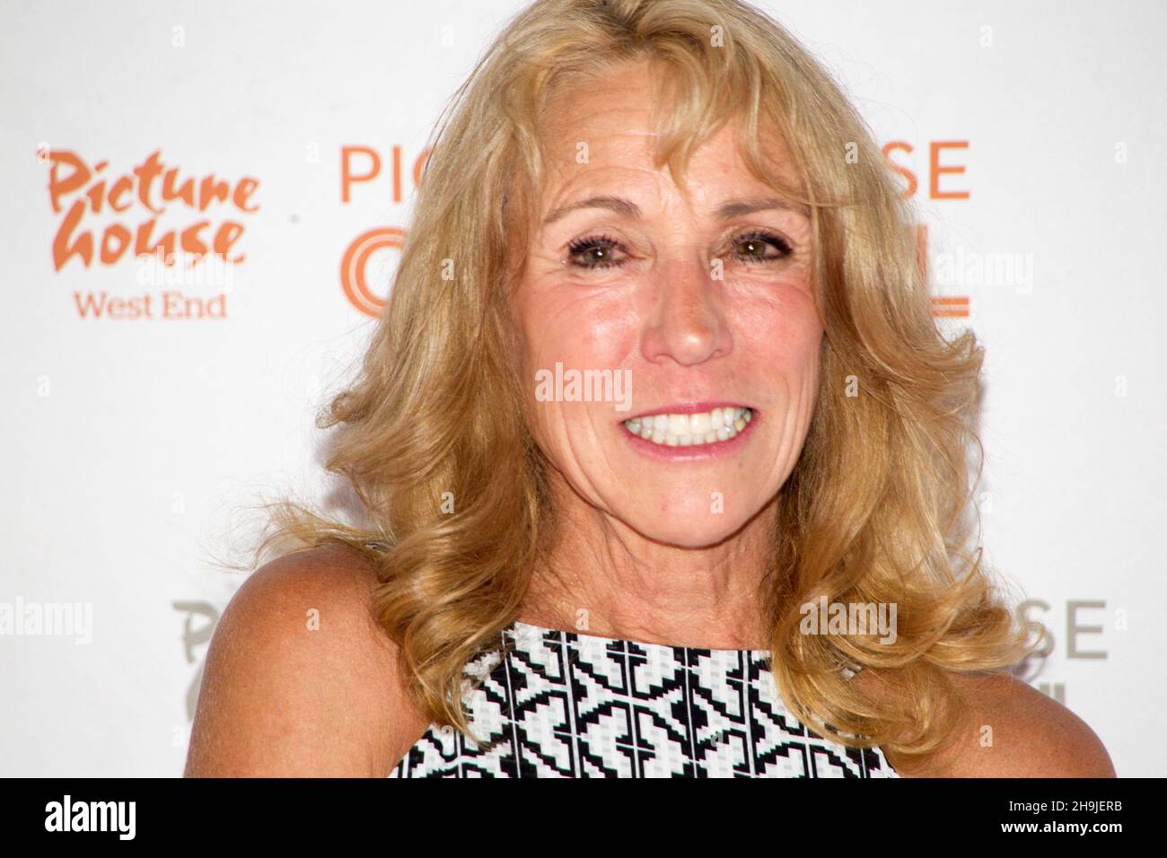 Mary Decker posing for photos on the red carpet at the world premiere ...
