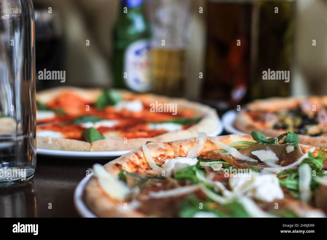 Pictures of people eating and being served pizza at Bush Hall's ...