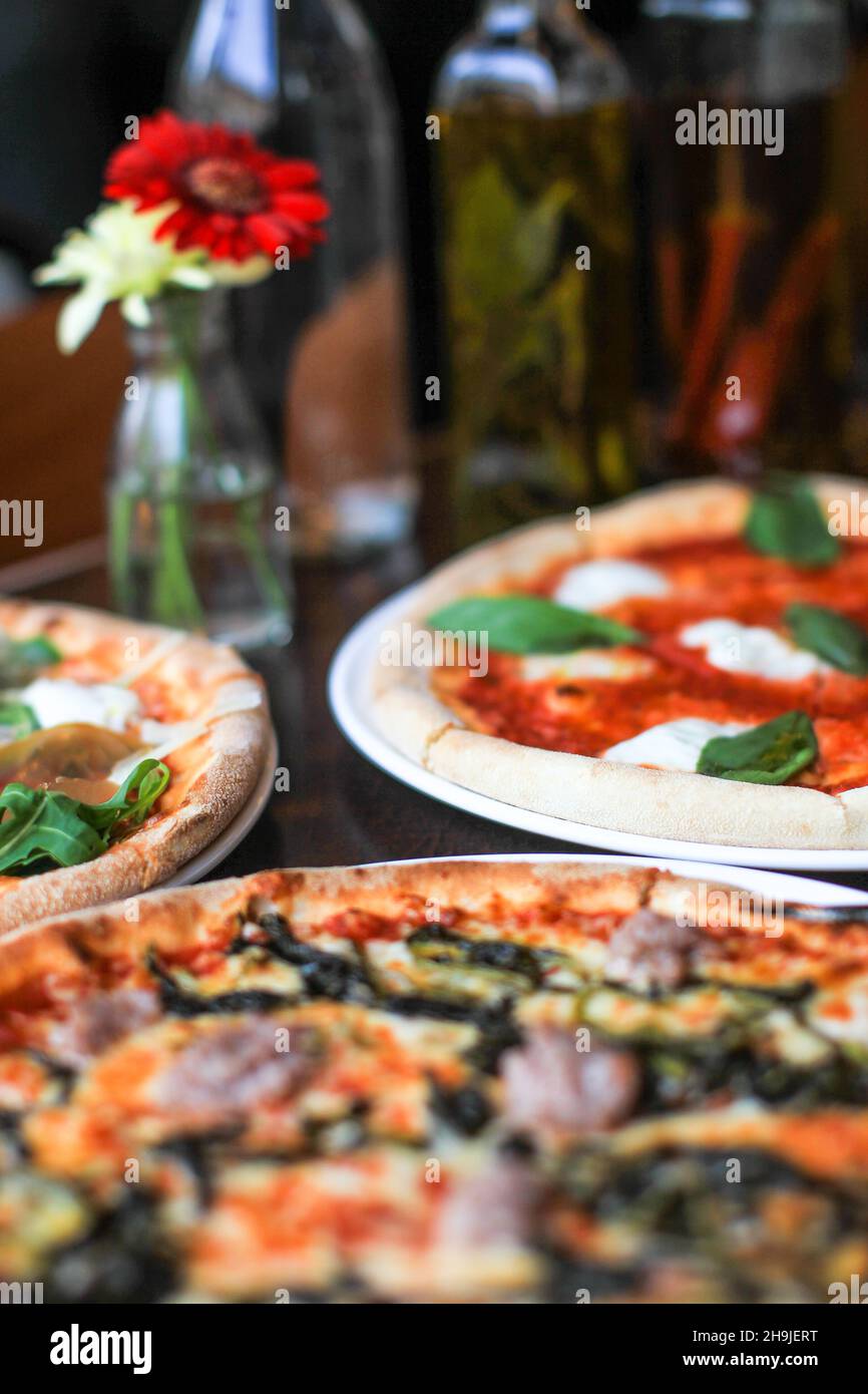 Pictures of people eating and being served pizza at Bush Hall's ...