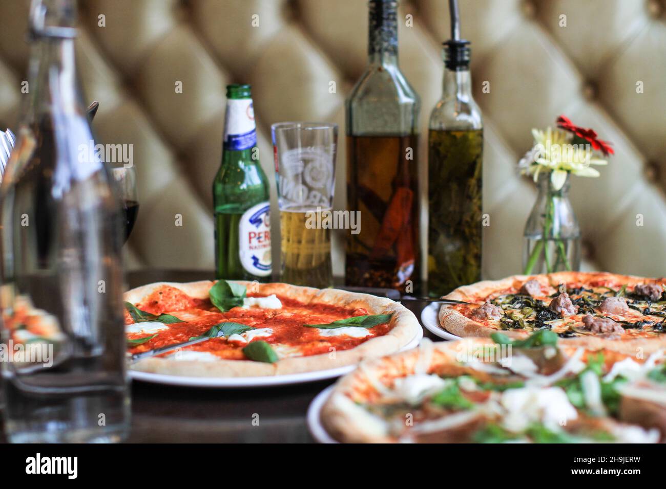 Pictures of people eating and being served pizza at Bush Hall's ...