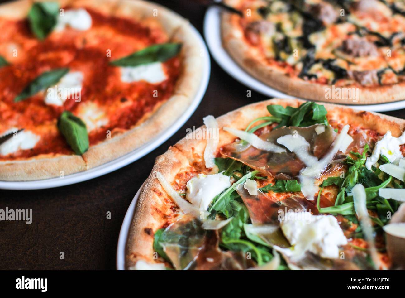 Pictures of people eating and being served pizza at Bush Hall's ...
